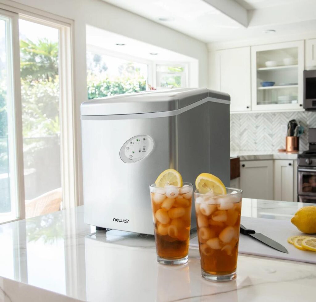 The Newair® Countertop Ice Maker. Bullet Ice, 28 lbs/day Brings ...